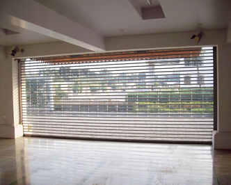 Roll up door - Gandhi Automations Pvt Ltd - polycarbonate / glazed ...
