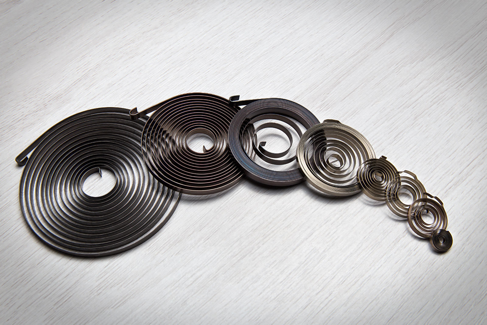 Torsion spring - MOLLIFICIO MAZZONI SRL - flat wire / spiral / metal