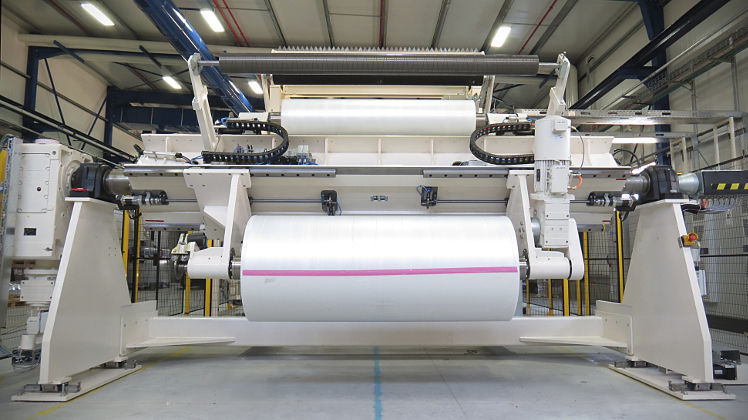 Wide material rewinder-winder - Roth Composite Machinery GmbH