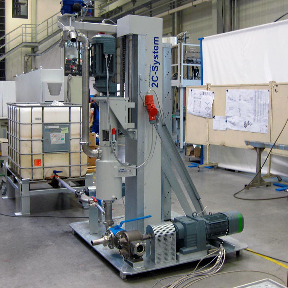 Continuous mixing system - Schmidt & Heinzmann GmbH & Co KG