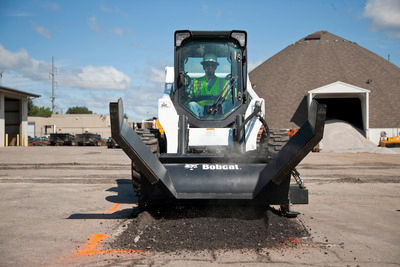 Skid steer loader asphalt float - BOBCAT