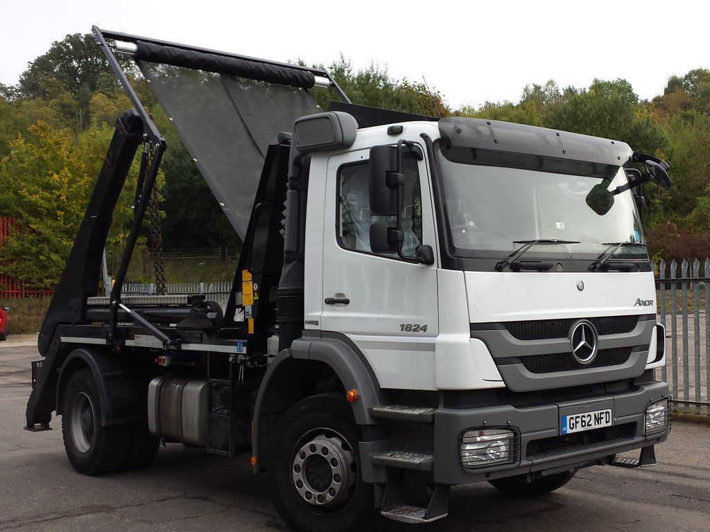 Hydraulic tarpaulin system - SkipCovering - Transcover - skip