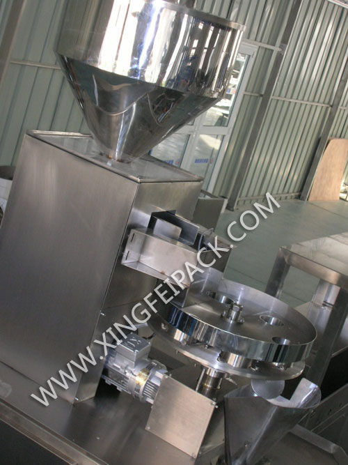 Granules dosing dispenser - Shanghai Xingfei Packaging Machinery Co ...