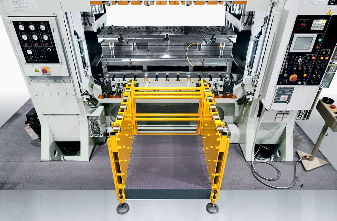 Machine tool loading and unloading system - Pascal Engineering Inc.