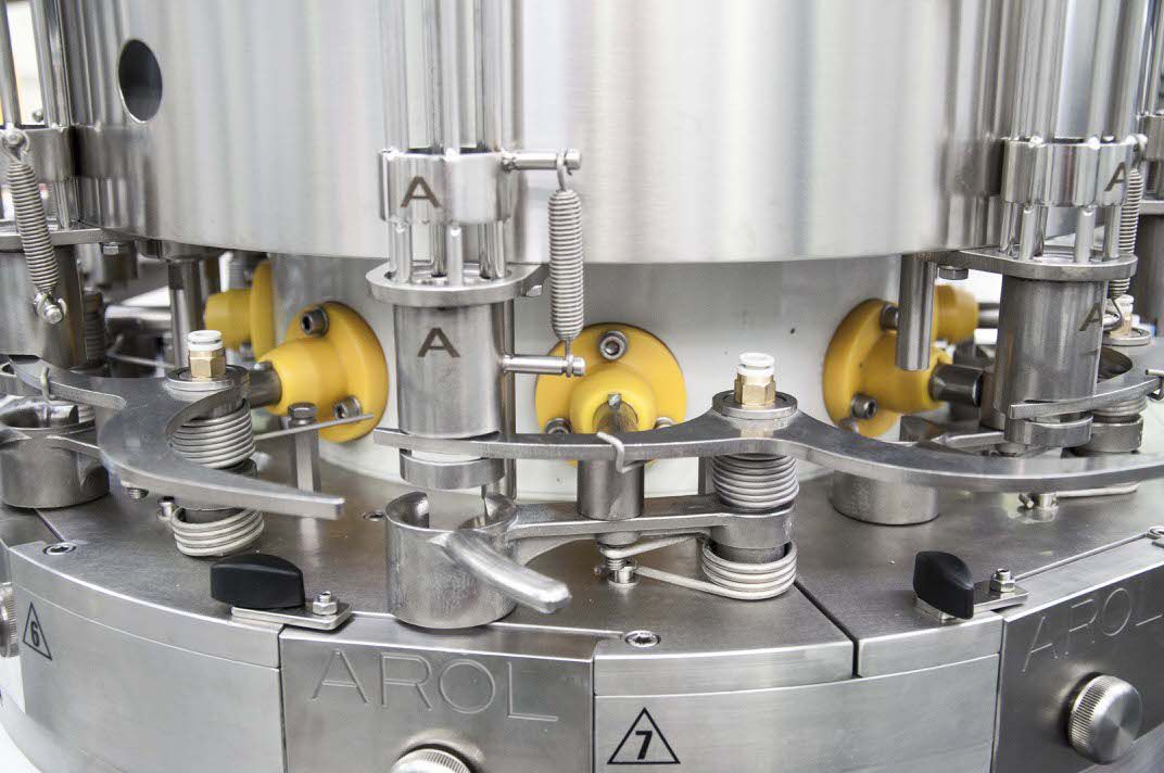 Rotary capping machine - SATURNO - AROL Closure systems - multi-head / automatic / for glass bottles