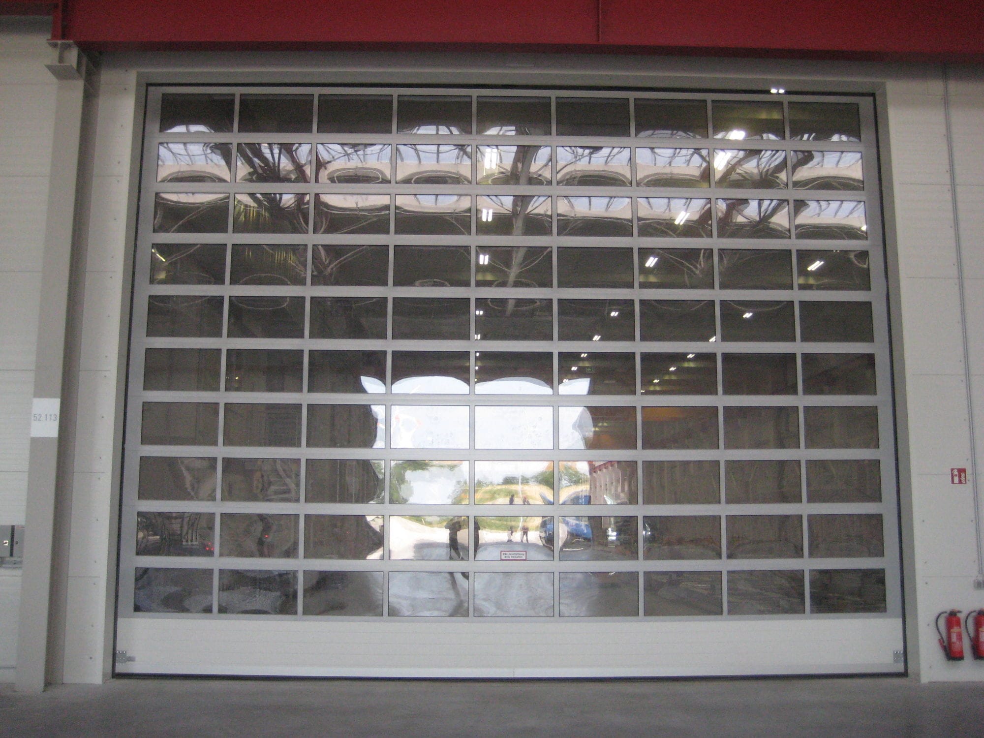 Sectional gate - TP LUX - Jansen Tore GmbH & Co.KG - vertical ...