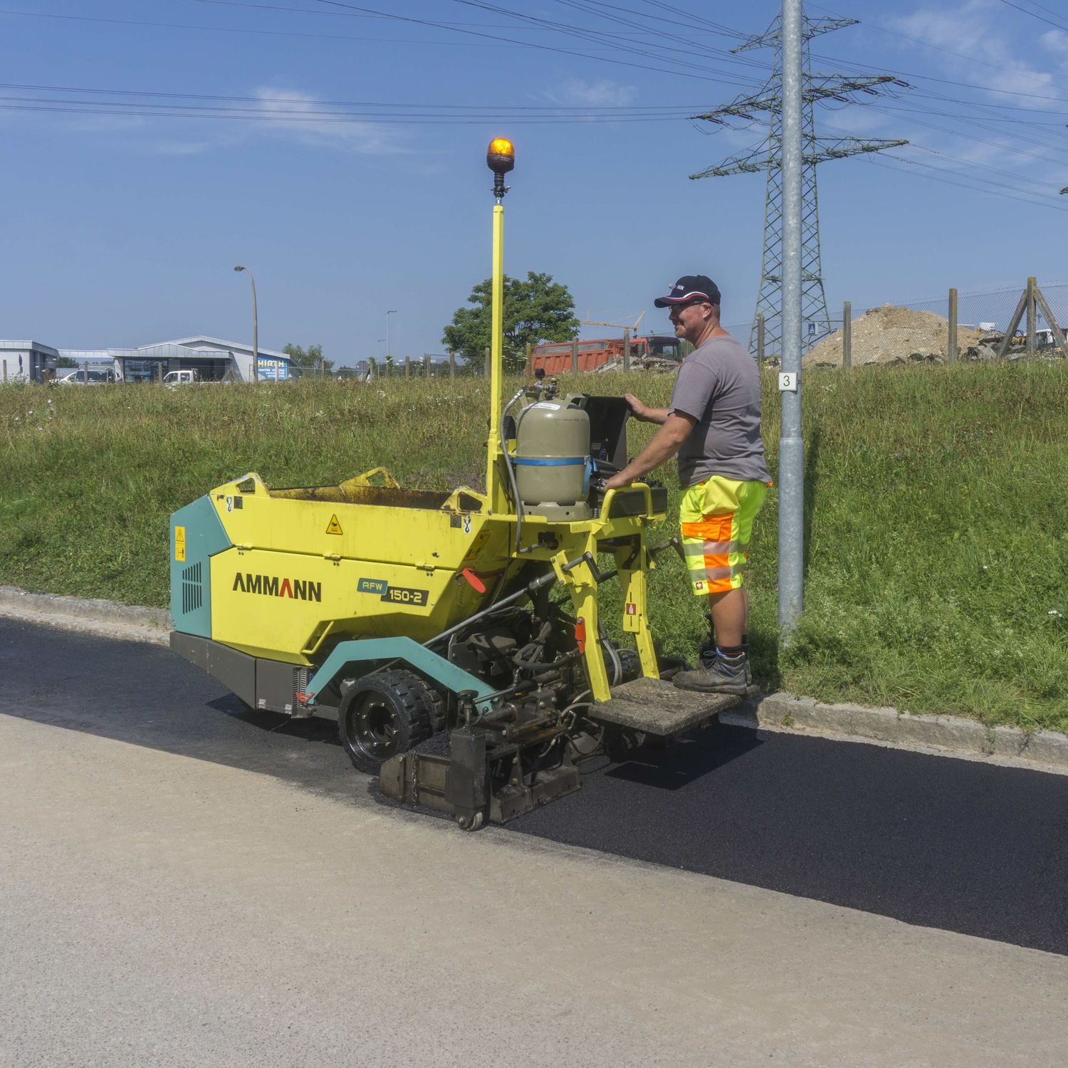 Asphalt paver - AFW 150-2 - Ammann - wheeled / for roads