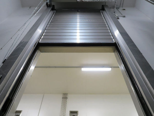 Sliding door - B.M.P. srl - vertical sliding / spiral / roll up