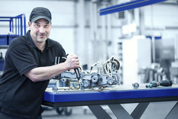 Hot runner system for automotive applications - Meusburger Georg GmbH ...