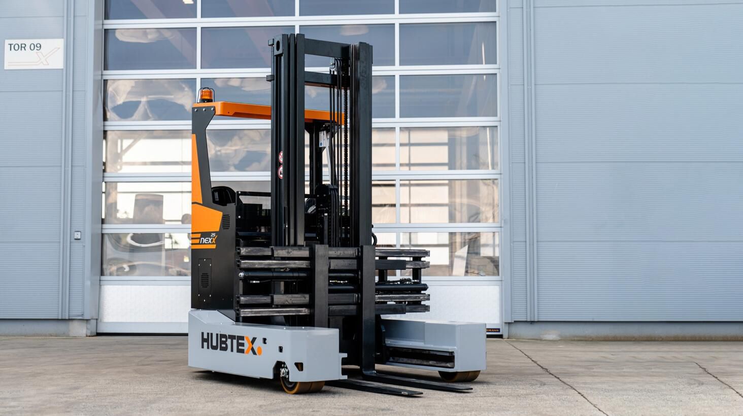 Electric reach truck - NexX 30 - HUBTEX - ride-on / handling / transport