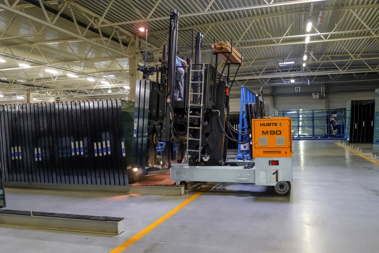 Electric side loader - M 90 - HUBTEX - ride-on / handling / multi ...