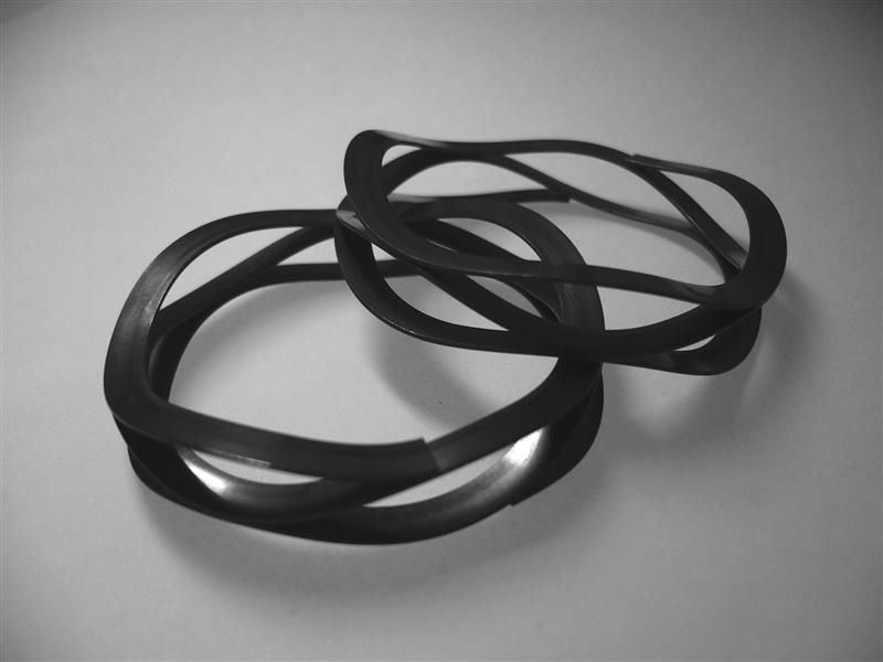 Compression spring - Barnes Group - flat wire / steel / for heavy loads