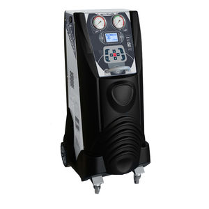 Gas evacuating and refilling device for automotive applications - All ...