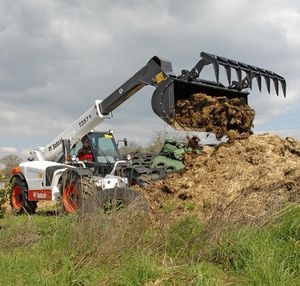 Bulk material self-dumping hopper - BOBCAT