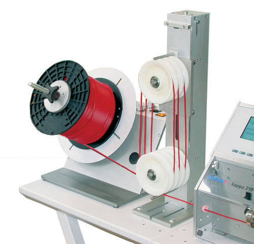 Cable feeding system - ads 115 - Komax AG