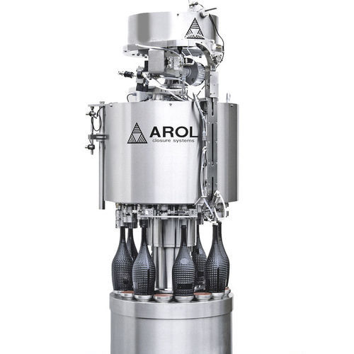 Rotary capping machine - ESSE - AROL Closure systems - crown ...