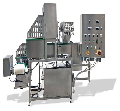 Automatic cheese molding machine - E.T.A. S.r.l.