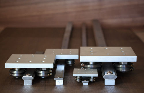Roller linear guide - Modern Linear - steel / aluminum / compact