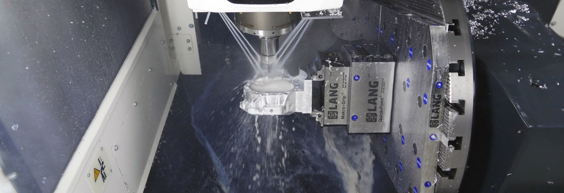 5-face machining of race car hub carrier with LANG workholding systems ...